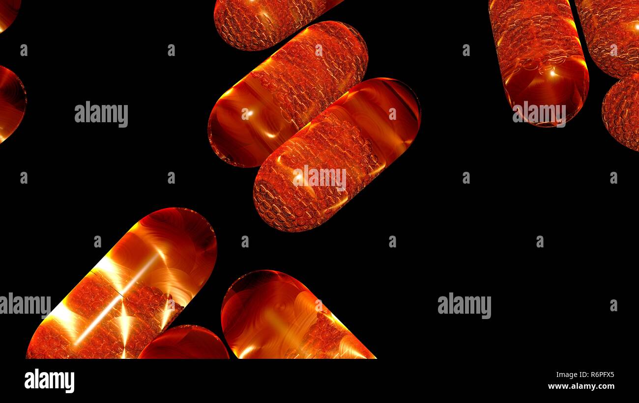 Close up view of shining capsule pills with small medicinal granules ...