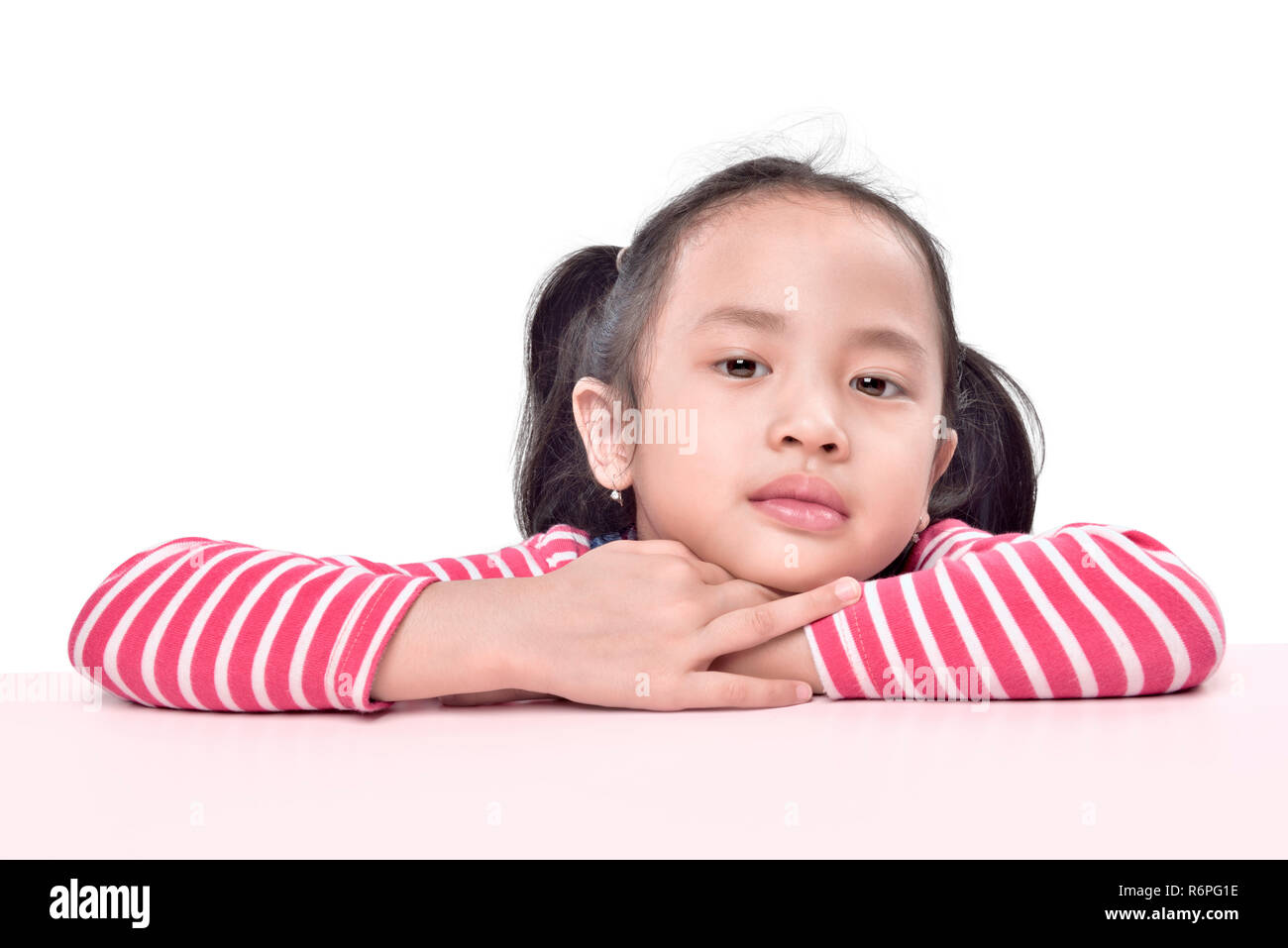 Portrait of asian little girl lean back on the table Stock Photo - Alamy