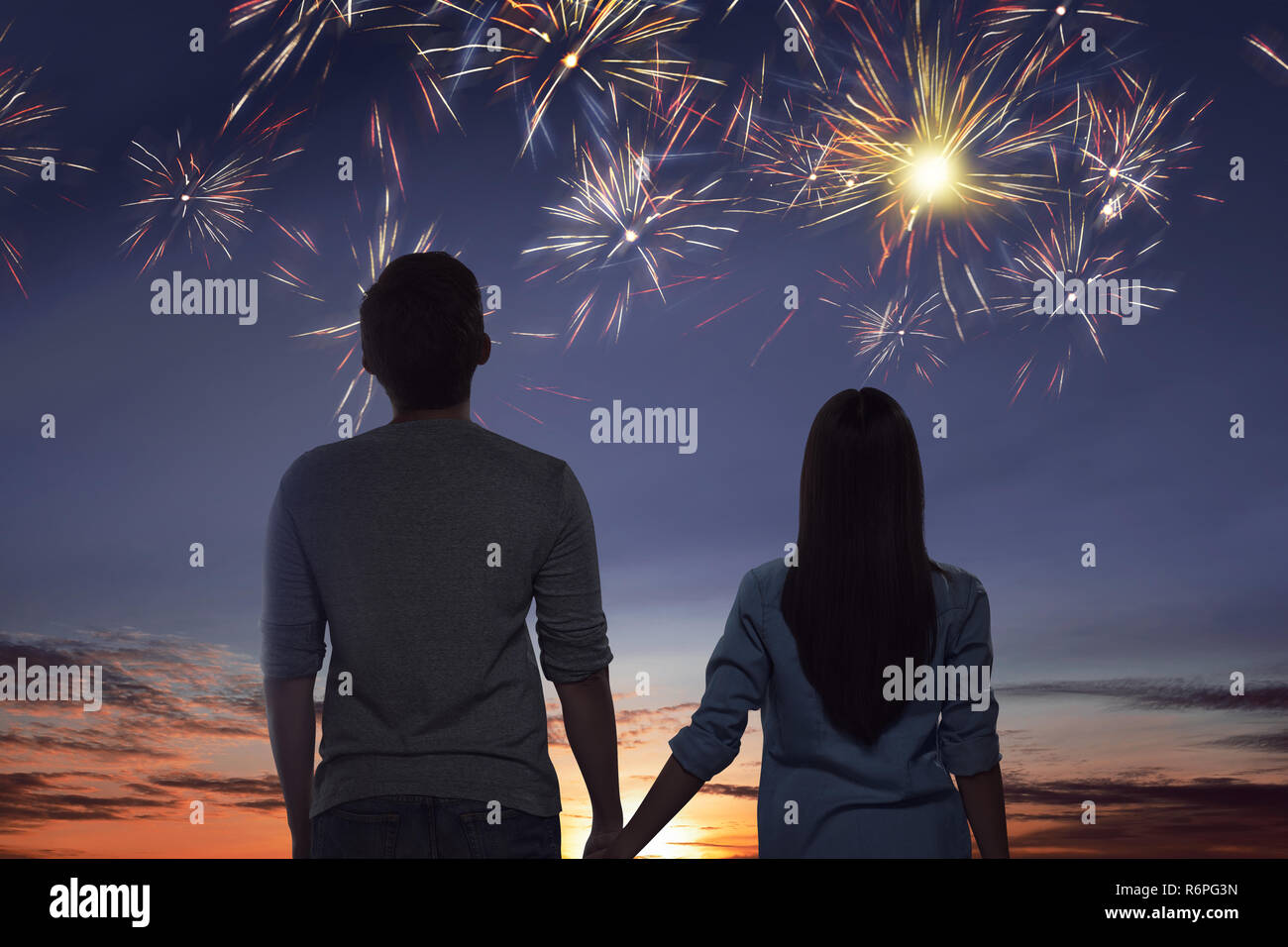Young people watching fireworks hi-res stock photography and images - Alamy