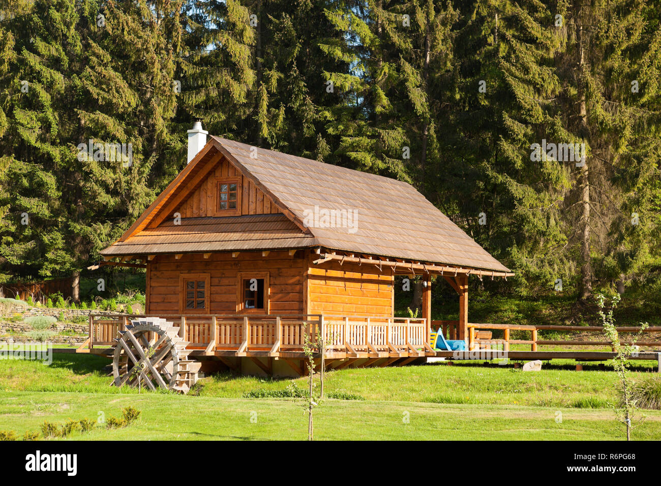 Wooden cabin in forest Stock Photo - Alamy