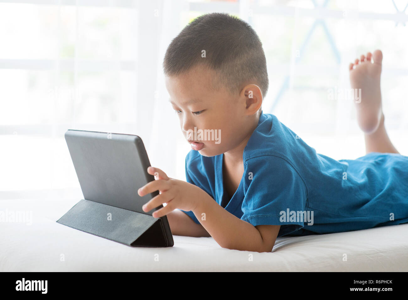 Concept tablet school asia hi-res stock photography and images - Alamy