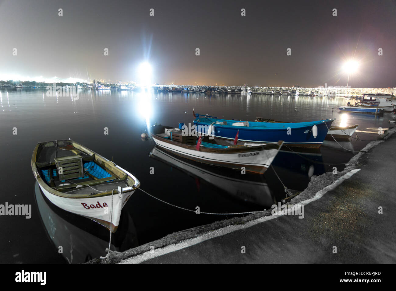 Boats in the night Stock Photo - Alamy