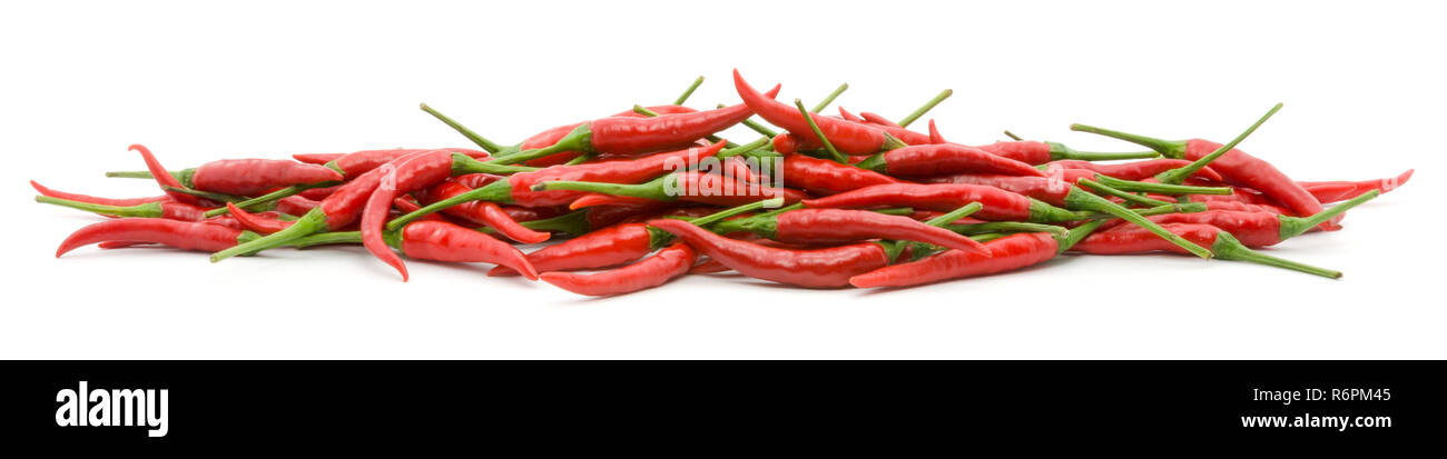 Stack of hot chili pepper or small chili padi, isolated on white ...
