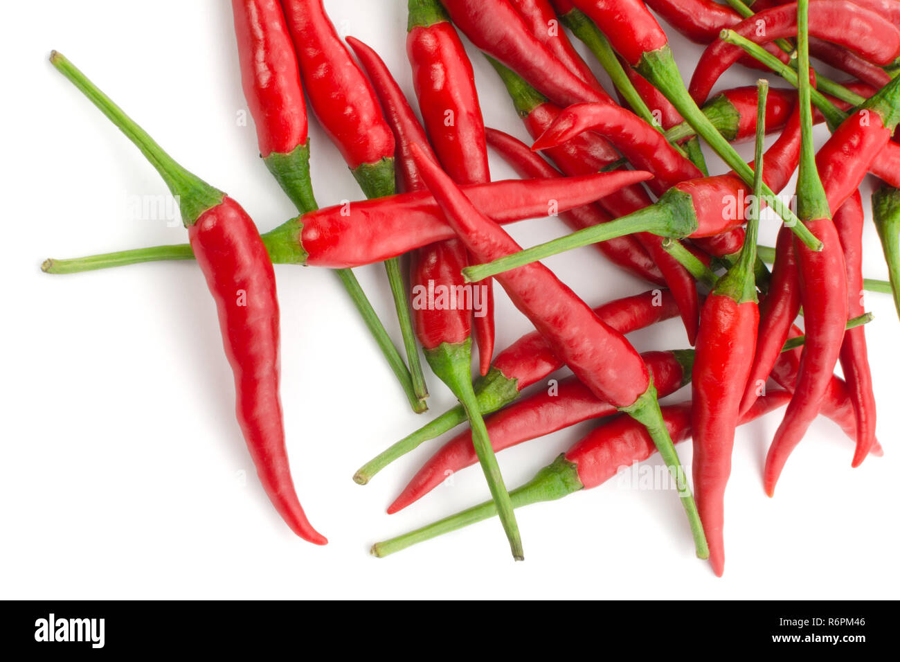 Stack of hot chili pepper or small chili padi, isolated on white ...
