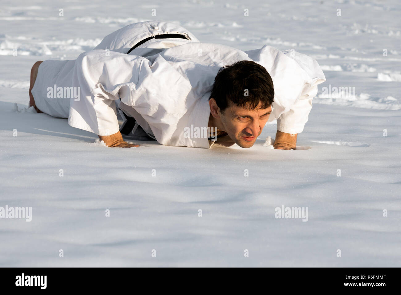 push up in snow Stock Photo - Alamy