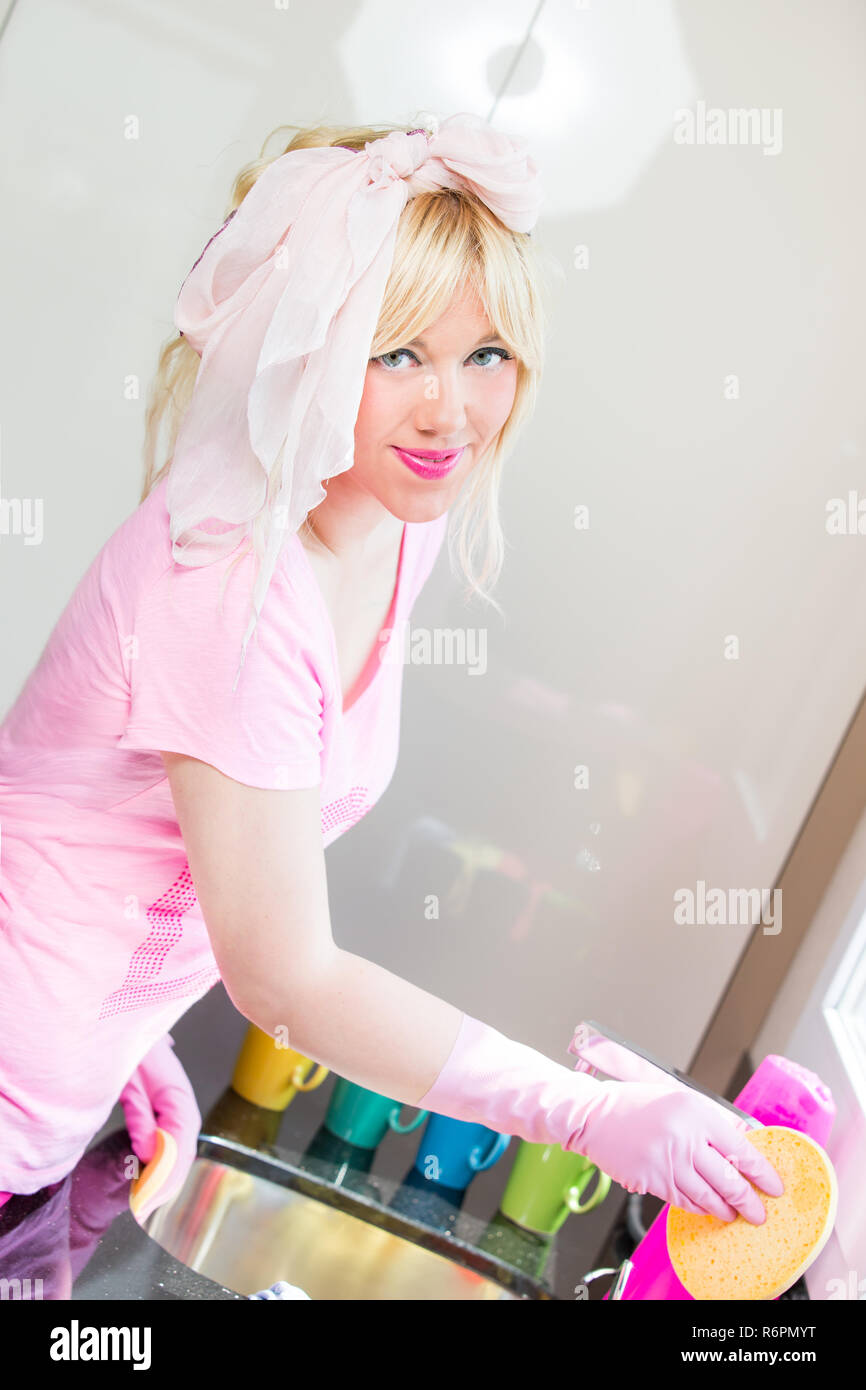 Beautiful woman at the cleaning Stock Photo - Alamy