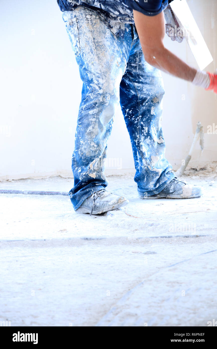 Construction worker with jeans and street shoes Stock Photo - Alamy