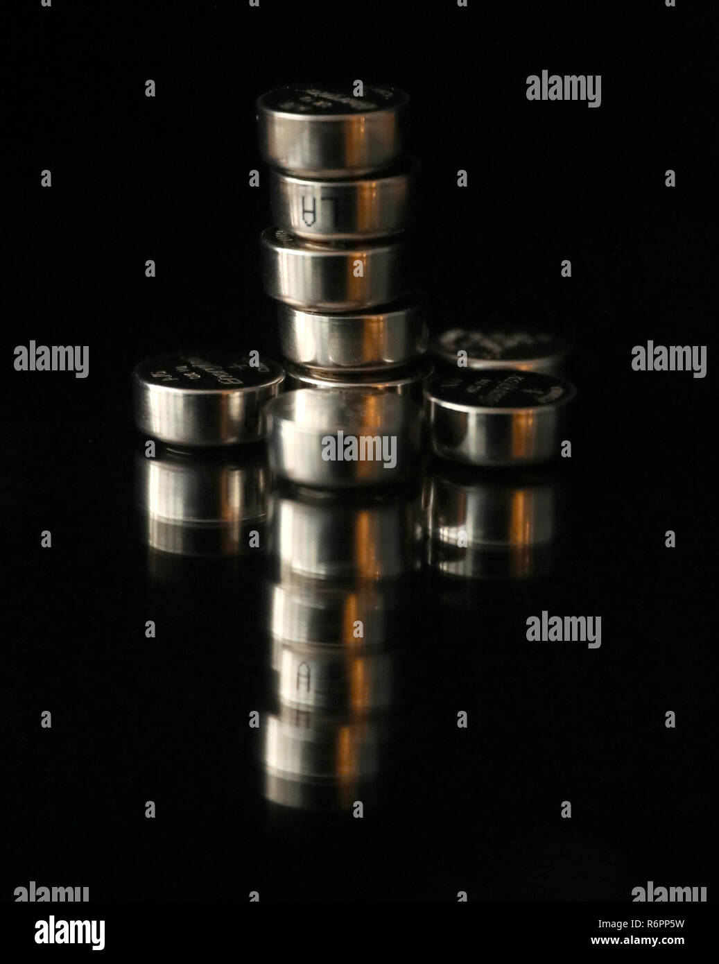 Child small button battery hi-res stock photography and images - Alamy