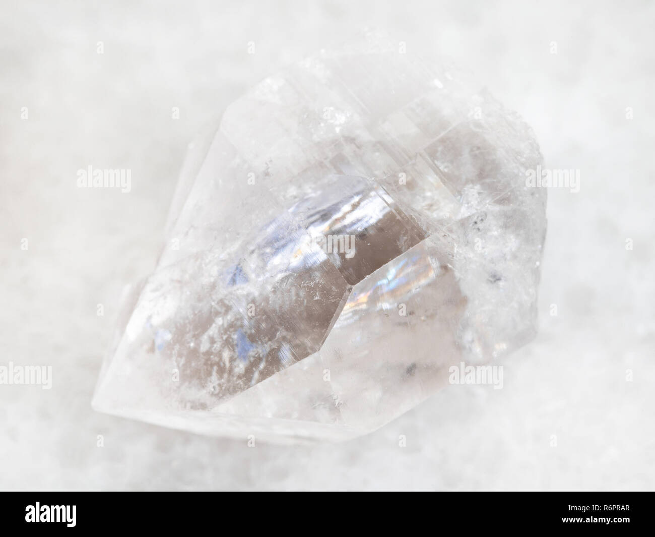 raw rock crystal of quartz gemstone on white Stock Photo - Alamy