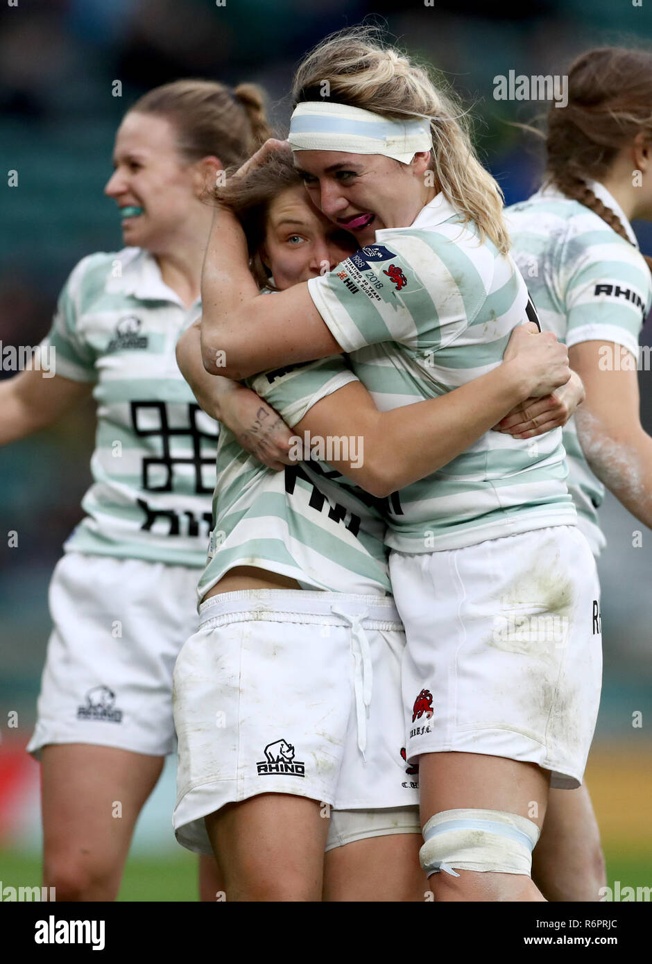 Cambridge captain Kate Marks (left) is congratulated after victory in ...