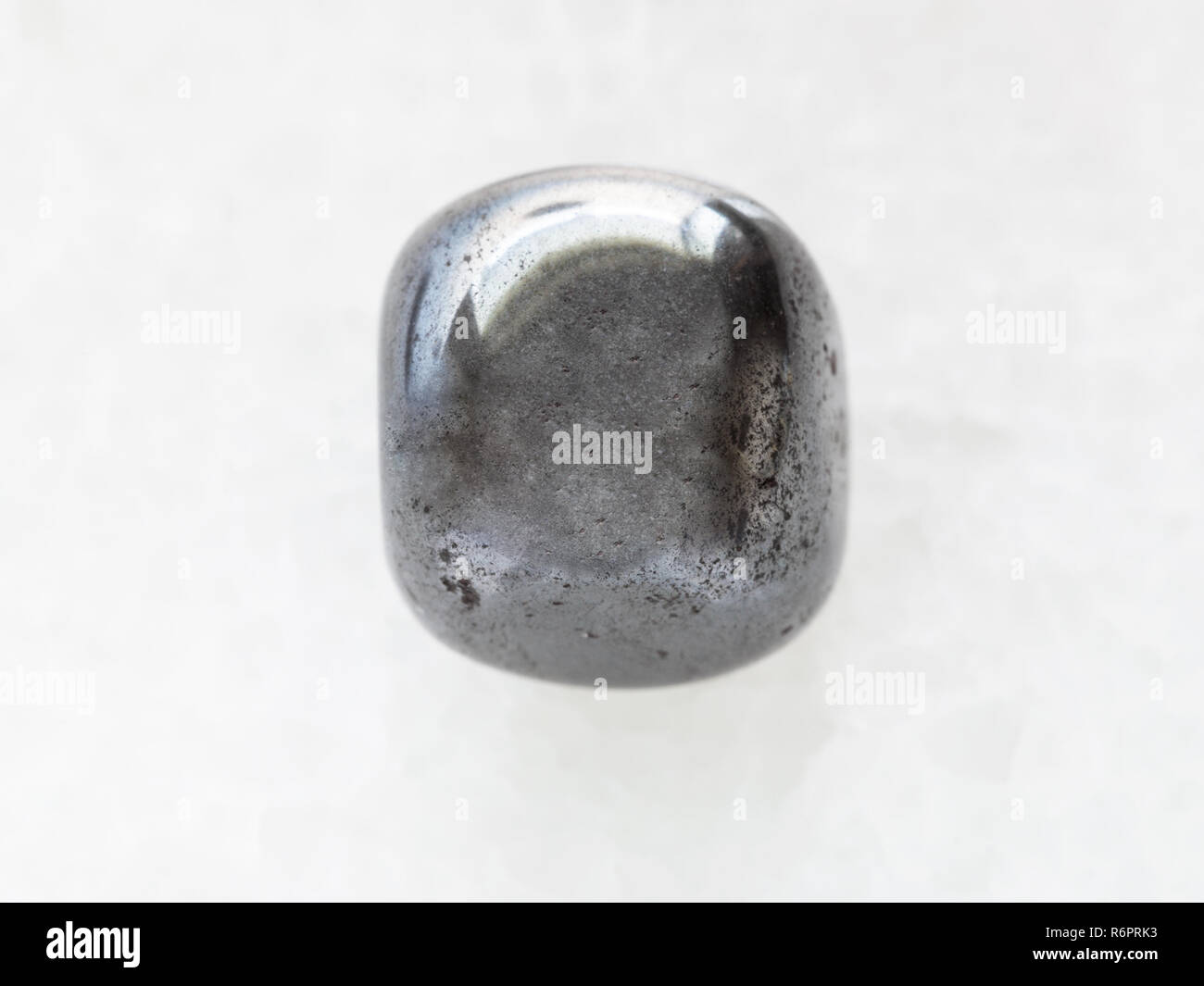 Black hematite pebble on stone hi-res stock photography and images - Alamy