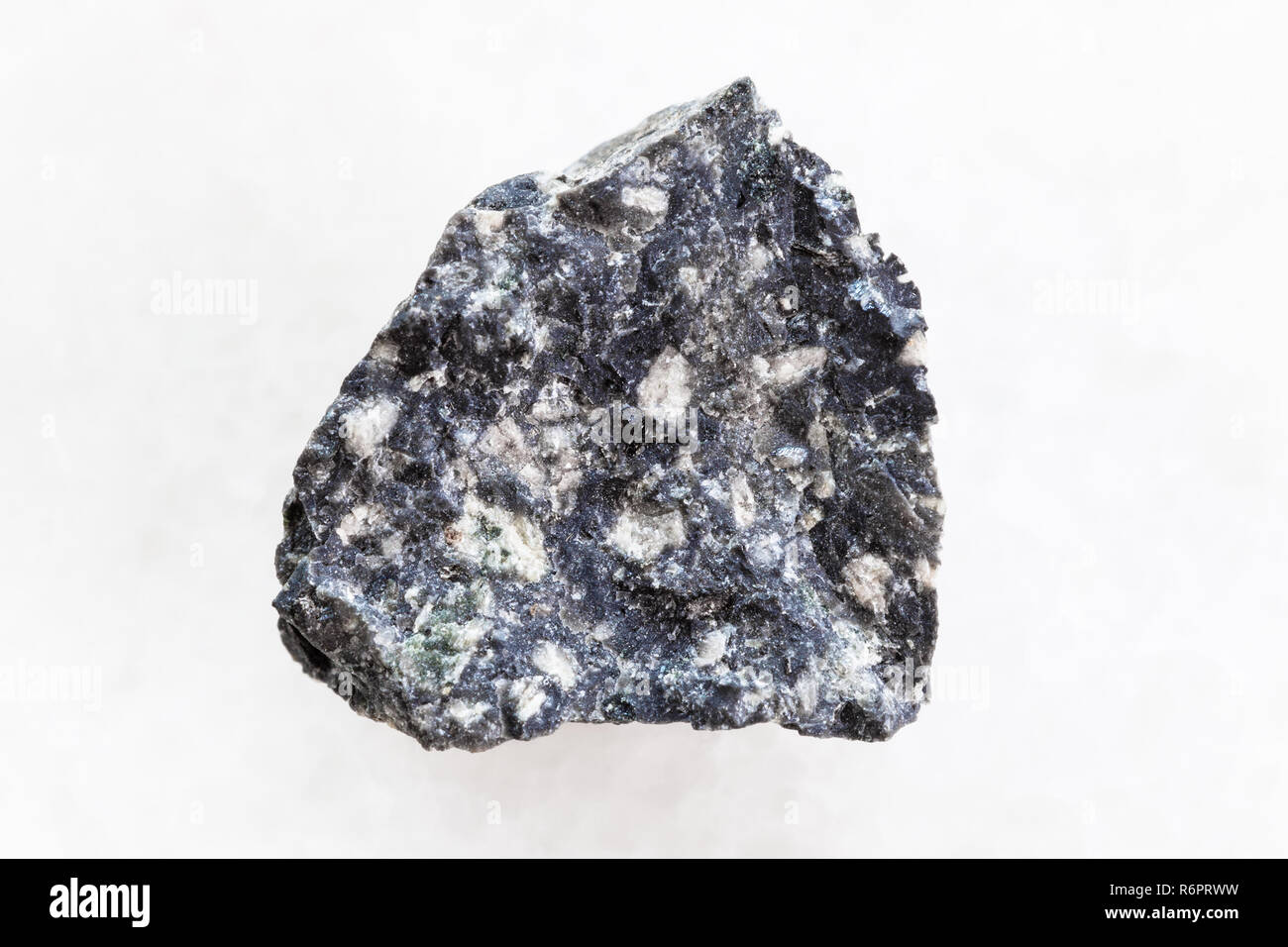 raw Andesite stone on white marble Stock Photo - Alamy
