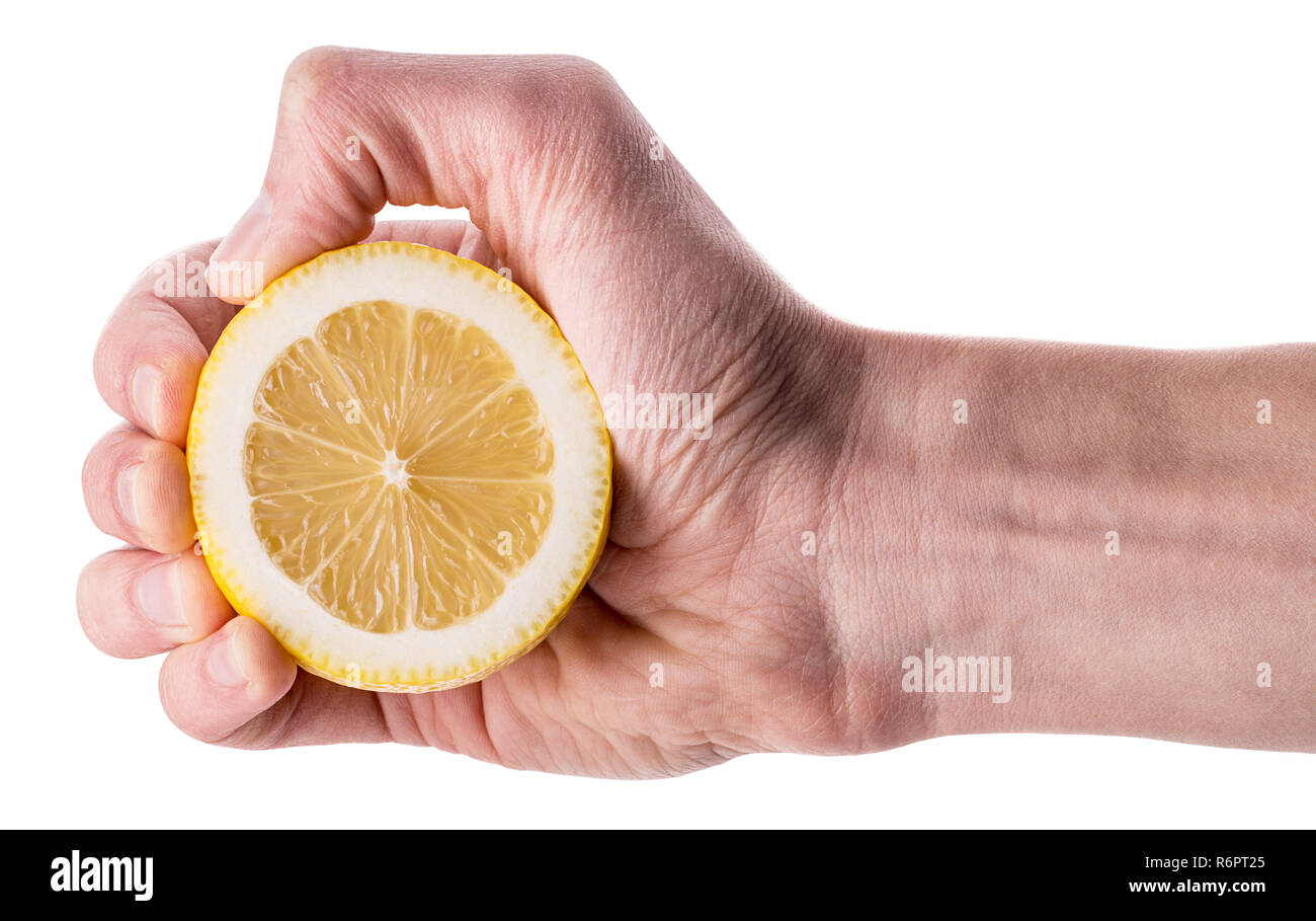 Hand squeezing half of lemon isolated on white background. Clipping ...