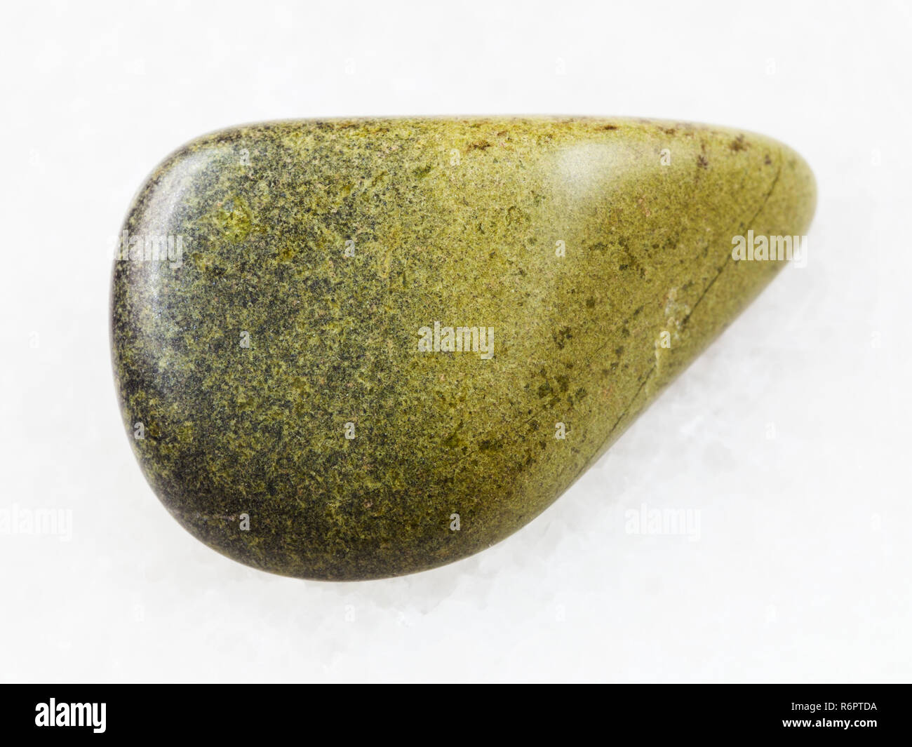 polished epidote gemstone on white marble Stock Photo - Alamy
