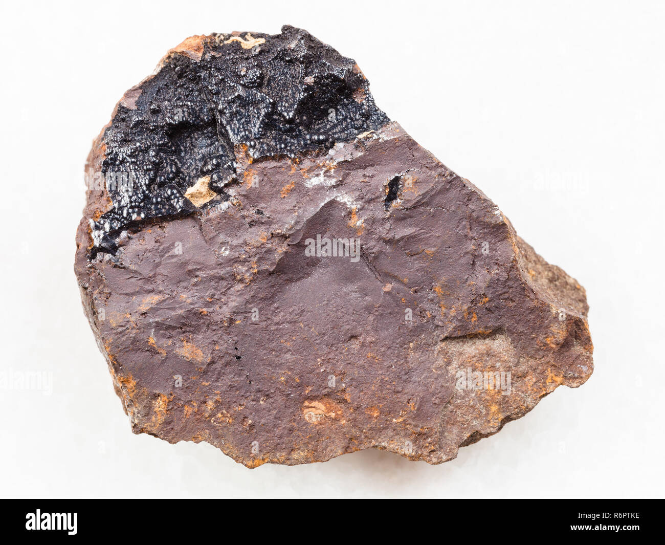goethite aggregates on limonite stone on white Stock Photo - Alamy