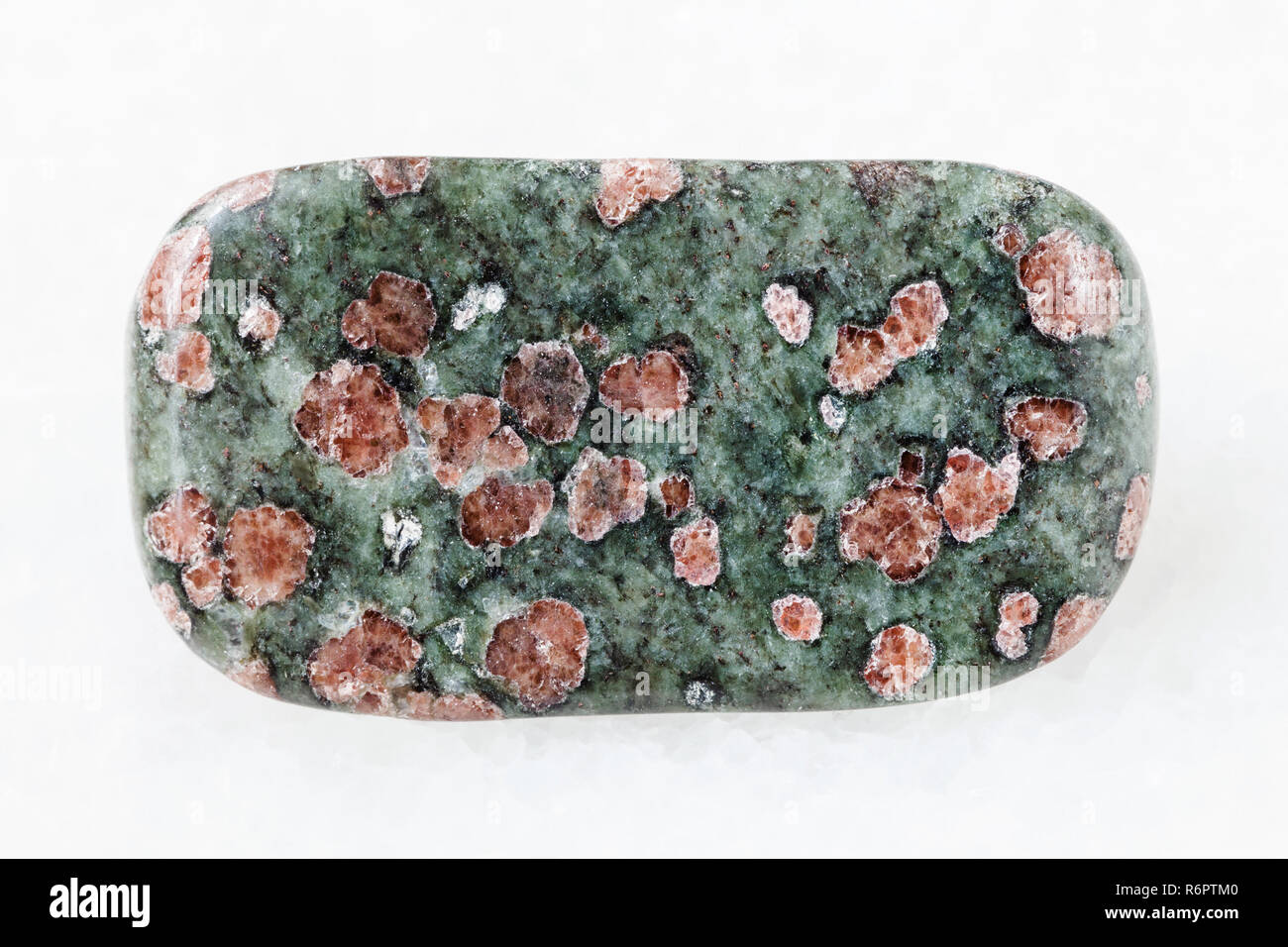 polished Eclogite gemstone on white Stock Photo - Alamy