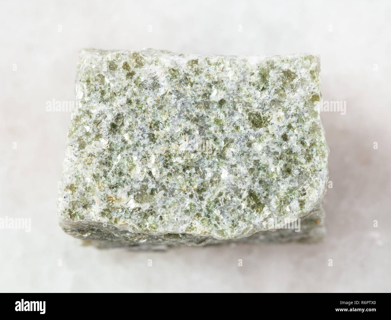 raw quartz-mica schist stone on white Stock Photo - Alamy