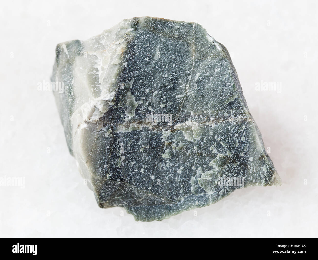 rough hornstone stone on white Stock Photo - Alamy