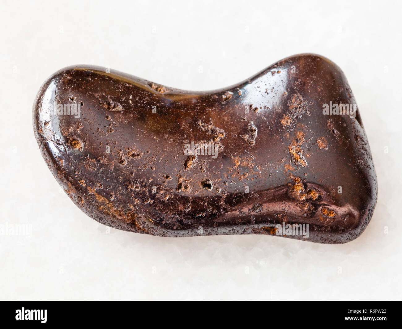 polished hydrogoethite gemstone on white Stock Photo - Alamy