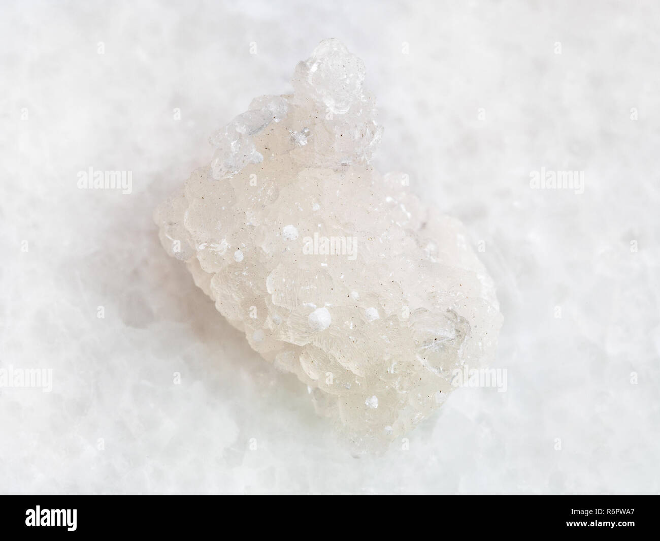 rough crystal of Prehnite with Okenite on white Stock Photo - Alamy