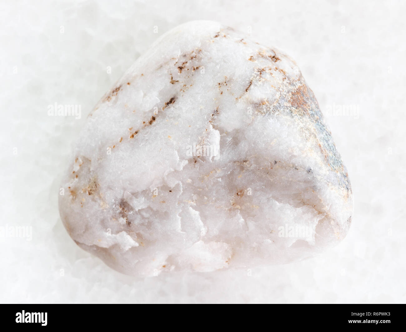 tumbled marble stone on white marble Stock Photo - Alamy