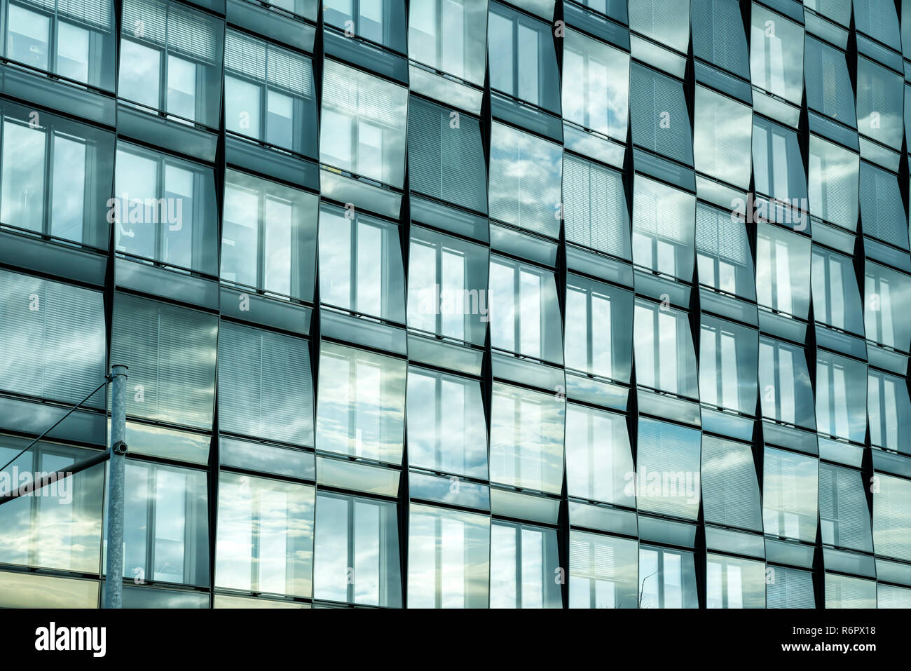 modern city building windows reflection by evening Stock Photo - Alamy