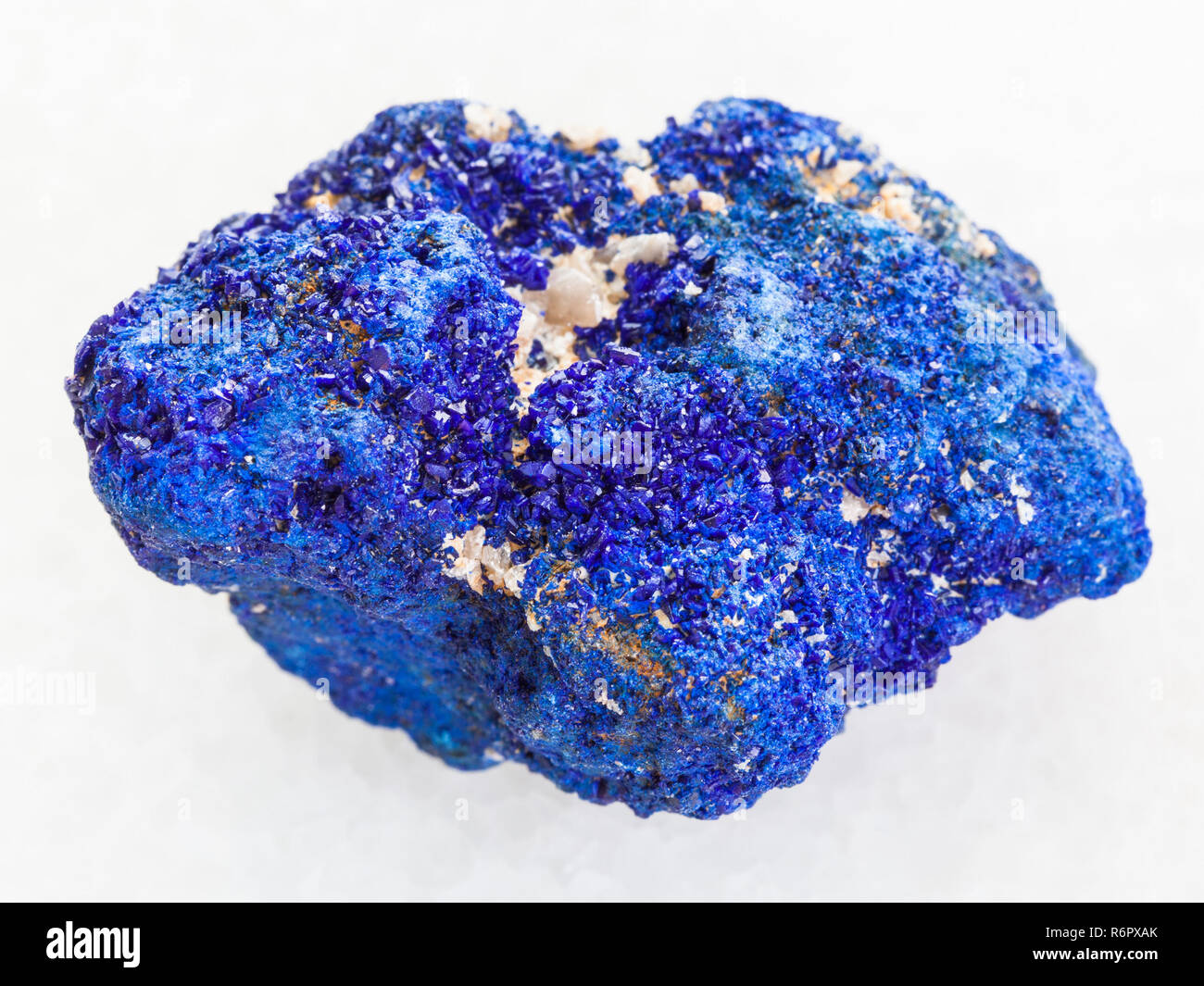 raw crystalline Azurite stone on white marble Stock Photo - Alamy