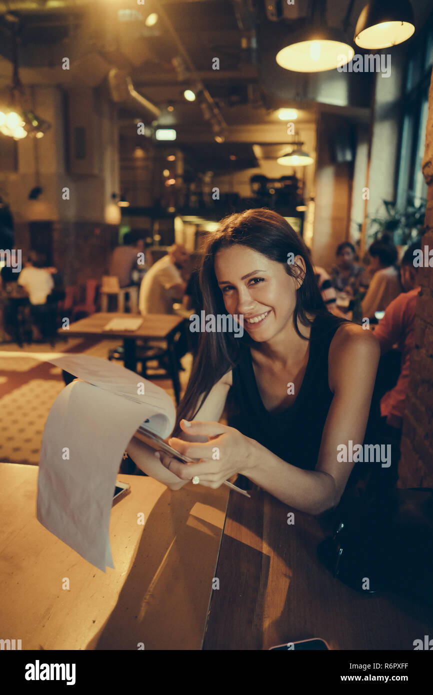 Female customer read menu hi-res stock photography and images - Alamy