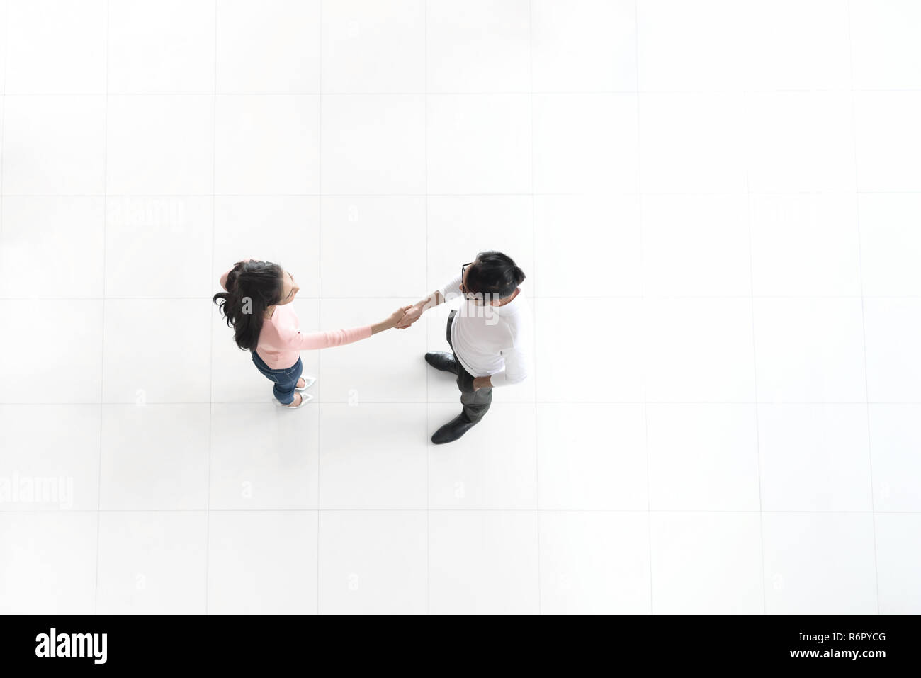 Top view of Asian business people shake hand together Stock Photo - Alamy