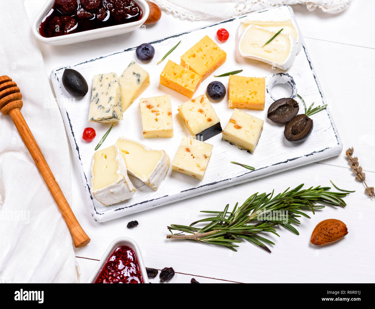 small pieces of brie cheese, roquefort, camembert, cheddar Stock Photo ...