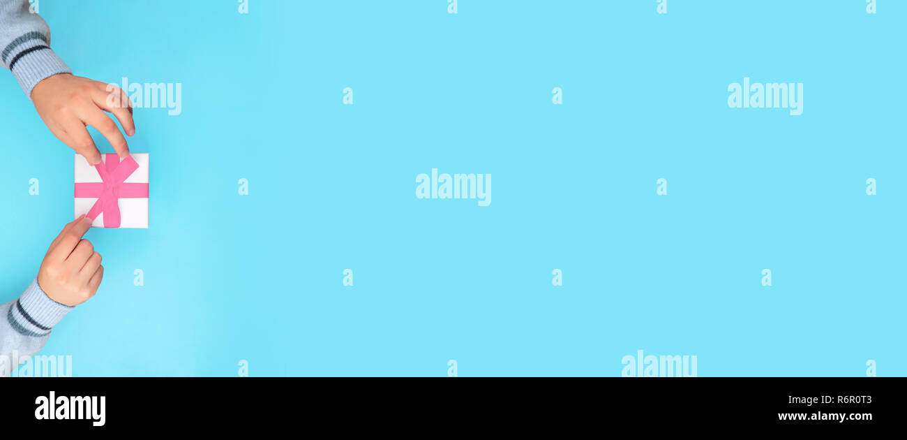 Top view of hands holding small box Stock Photo - Alamy