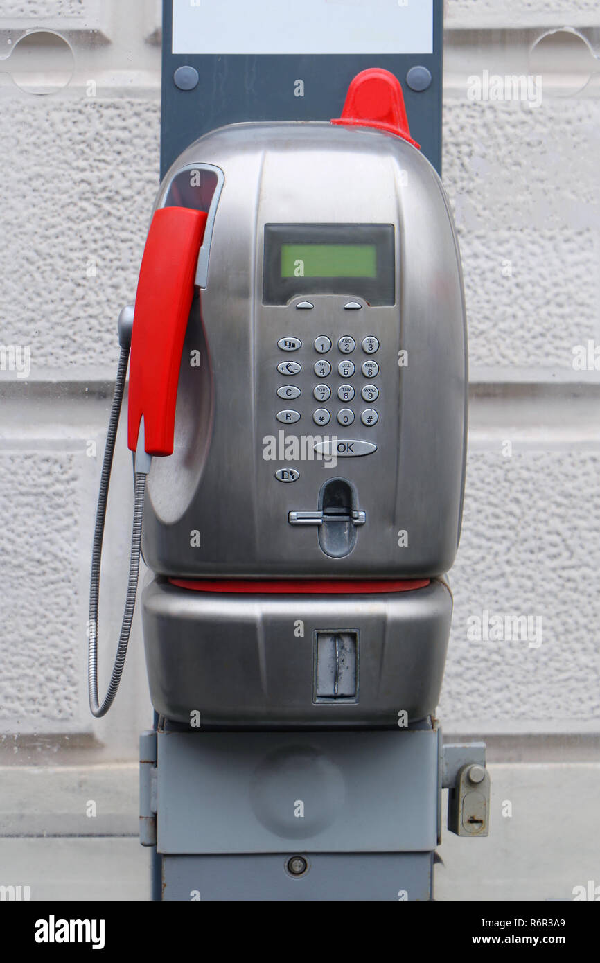Public payphone on street Stock Photo - Alamy