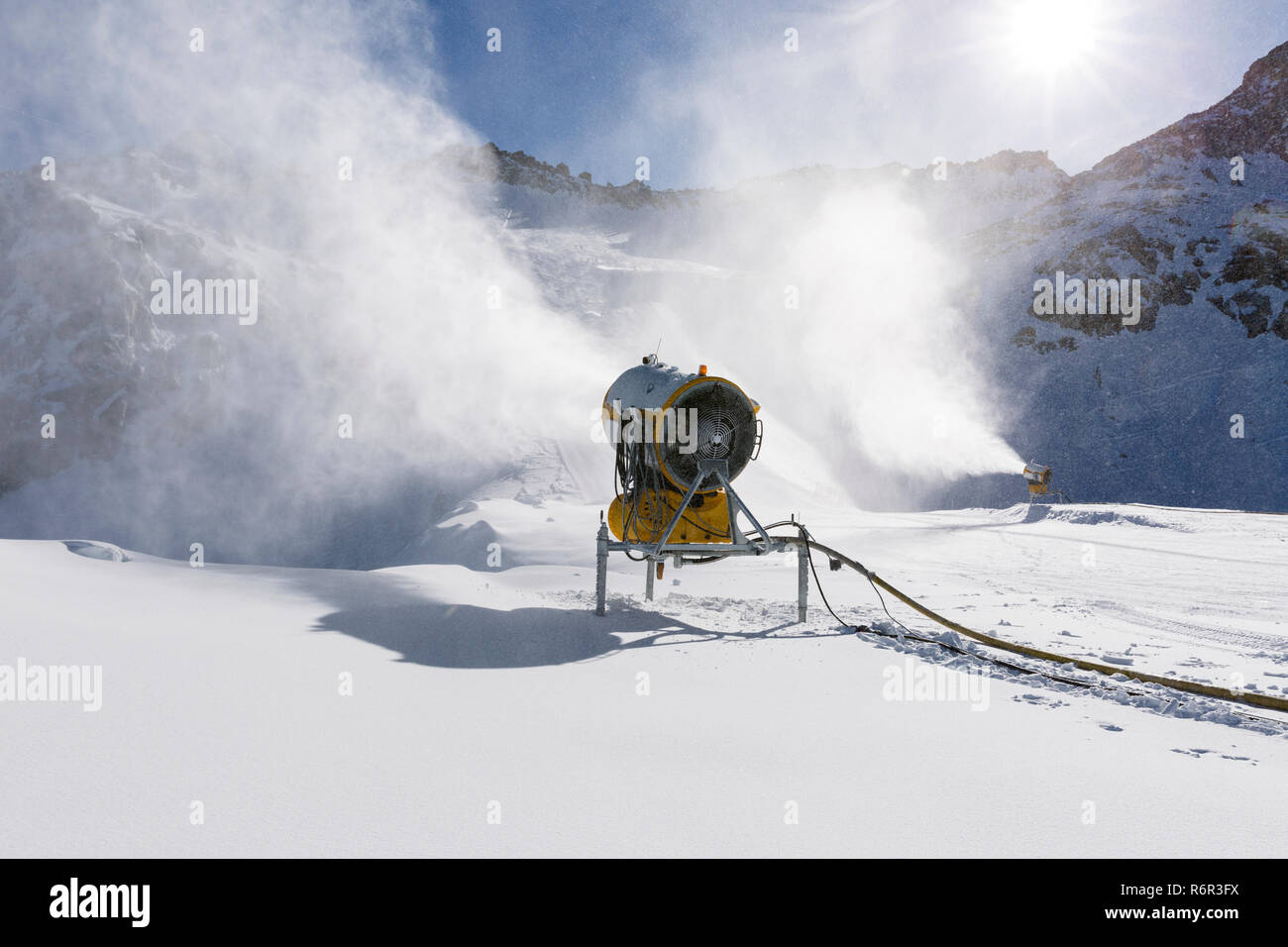 Snow cannon, snowmaker in action at ski resort Stock Photo - Alamy