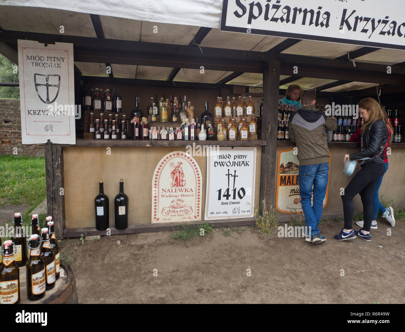 Outdoors market stall selling the traditional alcoholic spirits Nalewka ...