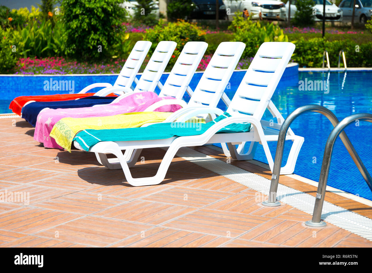 Sun chairs at the pool Stock Photo - Alamy