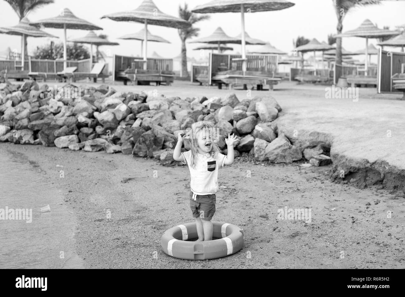 Kid playing beach holidays Black and White Stock Photos & Images - Alamy