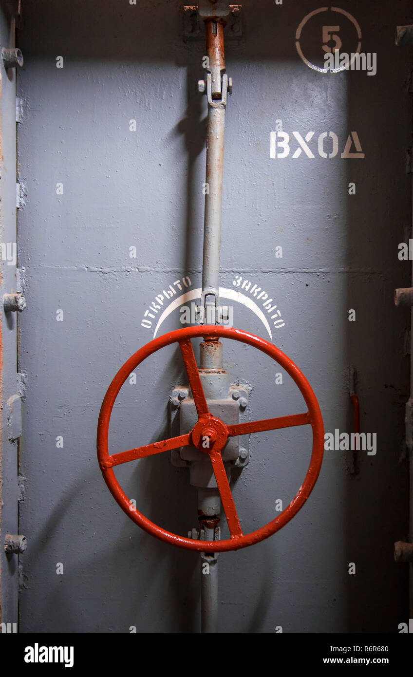 Heavy steel door with handweel Stock Photo - Alamy