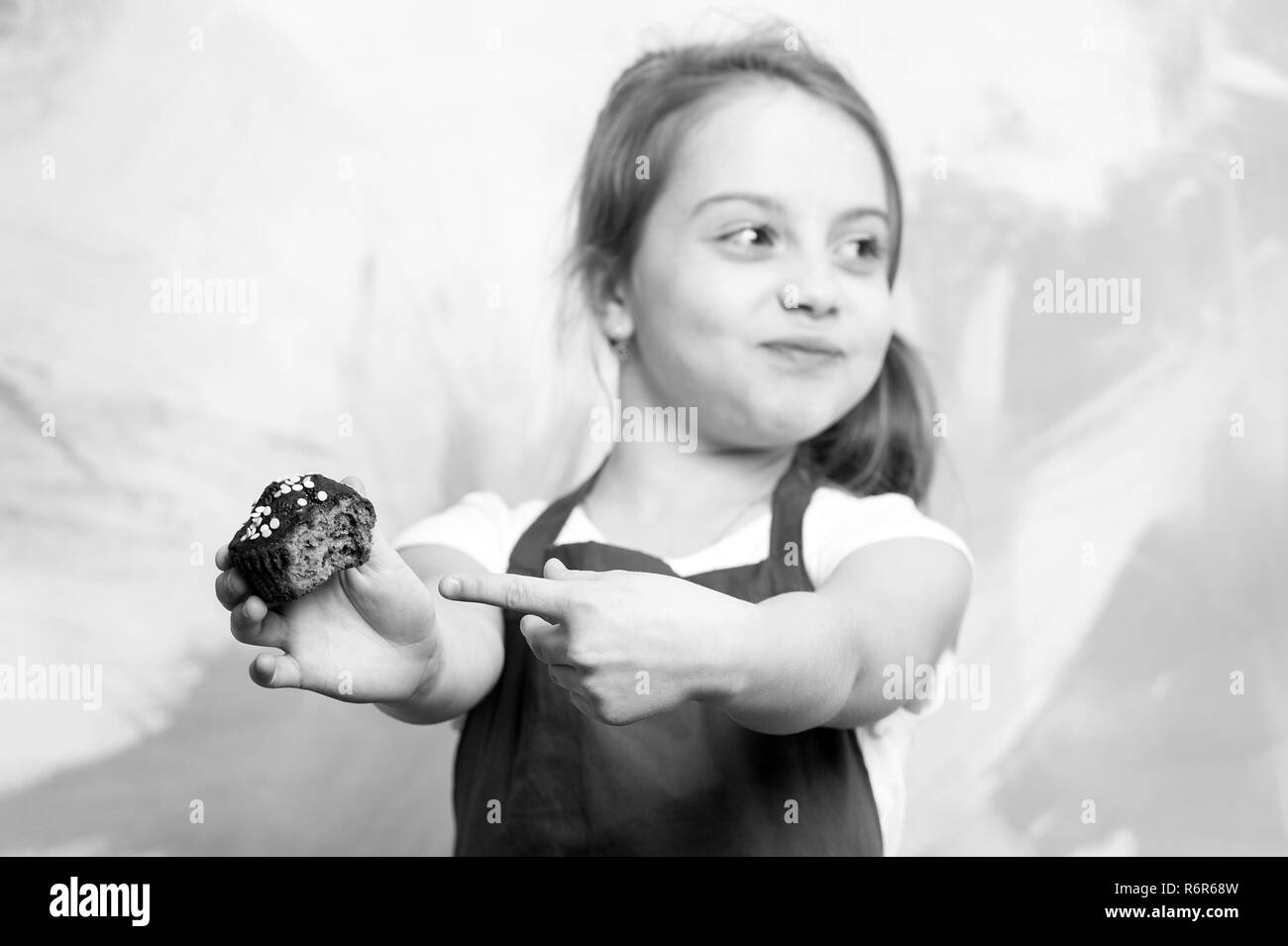 Cooking and eating. Childhood and education. Small girl on colorful ...