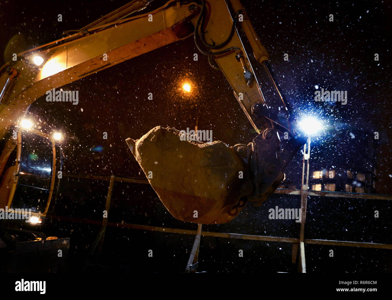 excavator bucket with sand at the construction site Stock Photo - Alamy