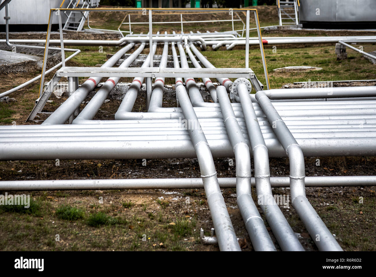 pipes and valves at oil refinery Stock Photo - Alamy