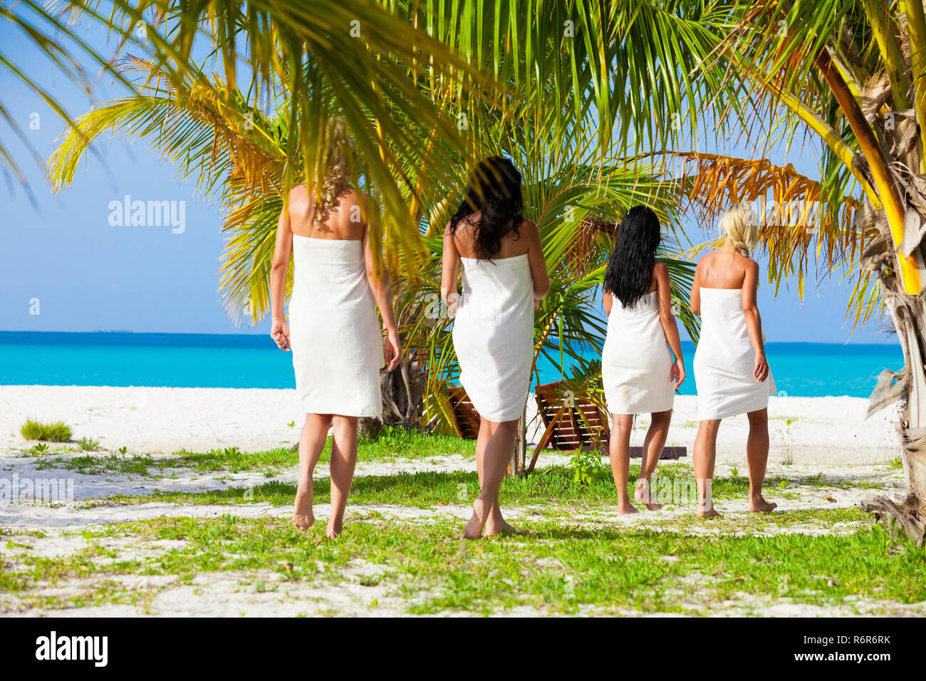 Girl group in Maldives Stock Photo - Alamy