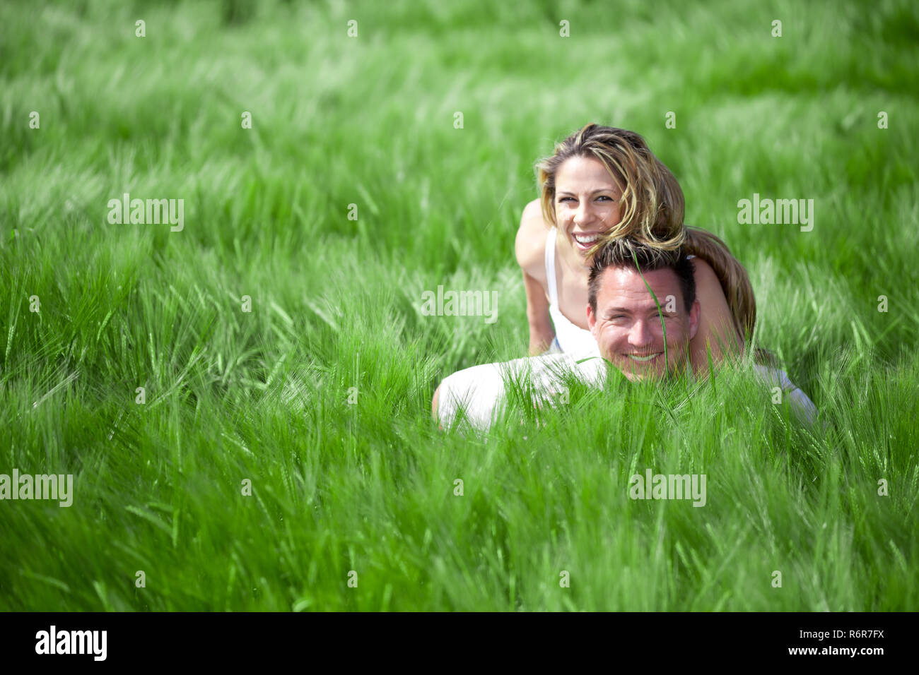 Happy People on summer Meadow Stock Photo - Alamy