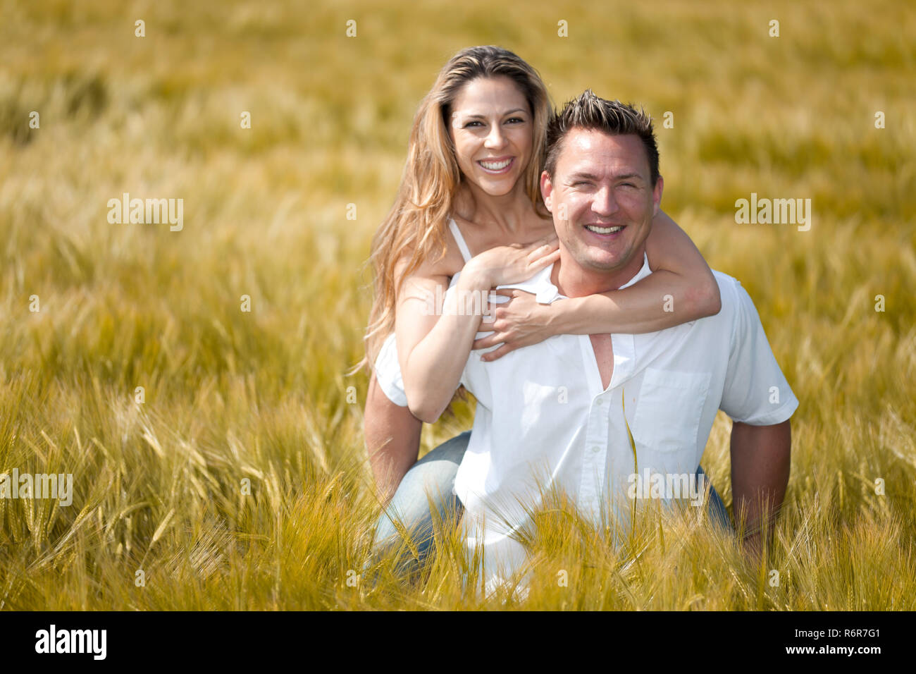 Happy People on summer Meadow Stock Photo - Alamy