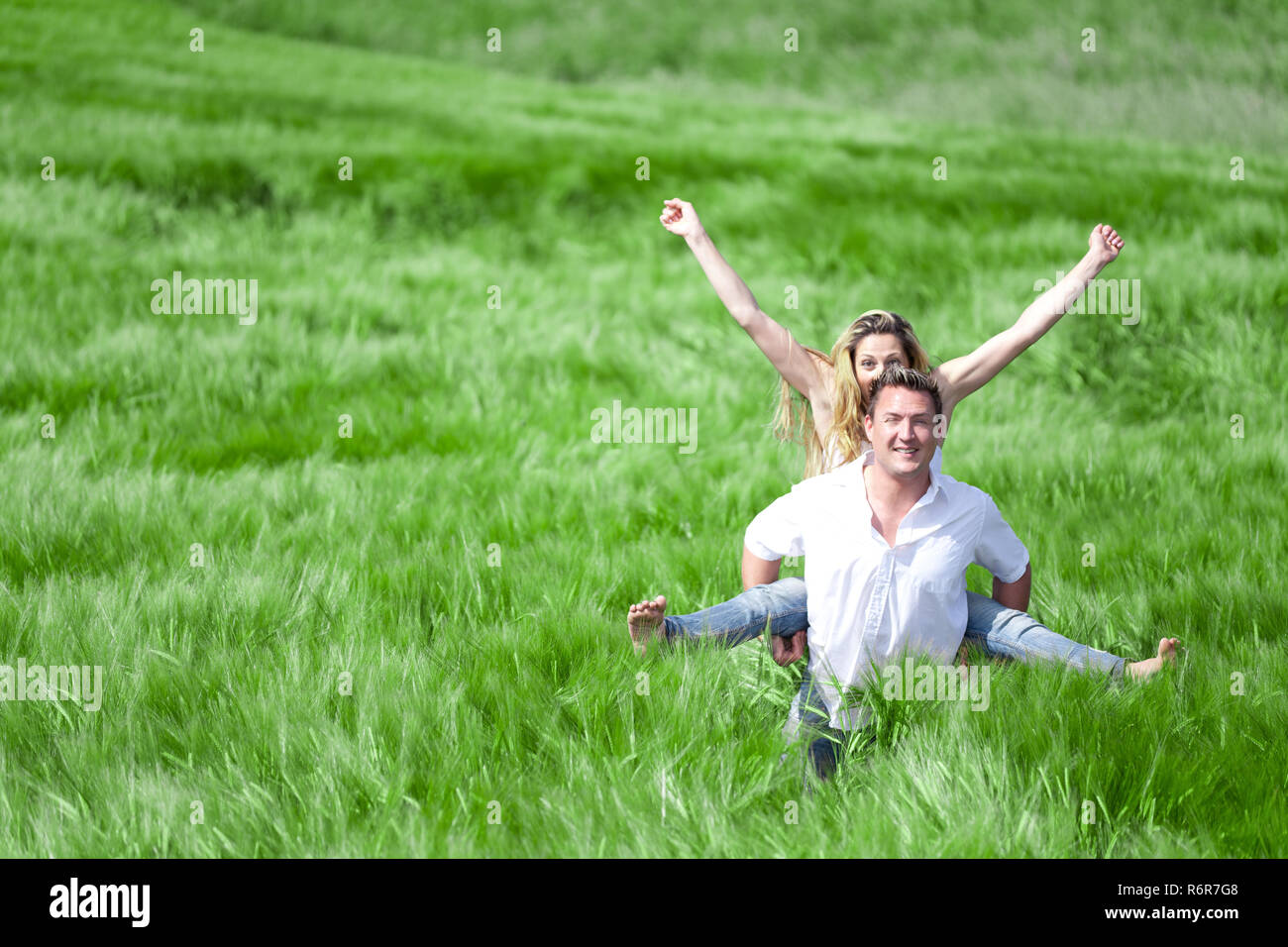Happy People on summer Meadow Stock Photo - Alamy