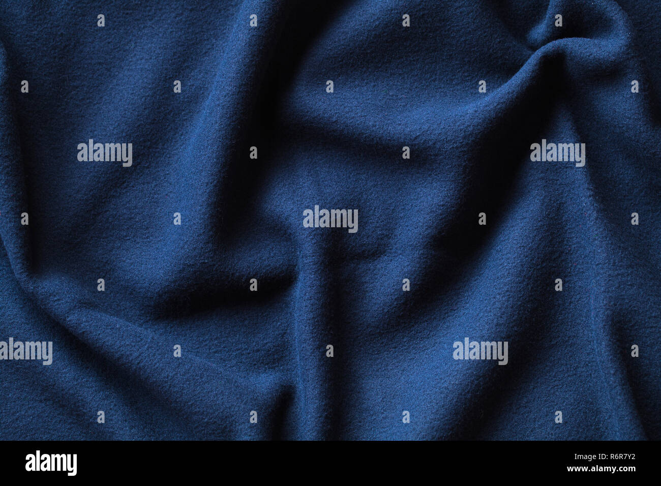 Wavy texture of blue fleece, soft napped insulating fabric made from ...