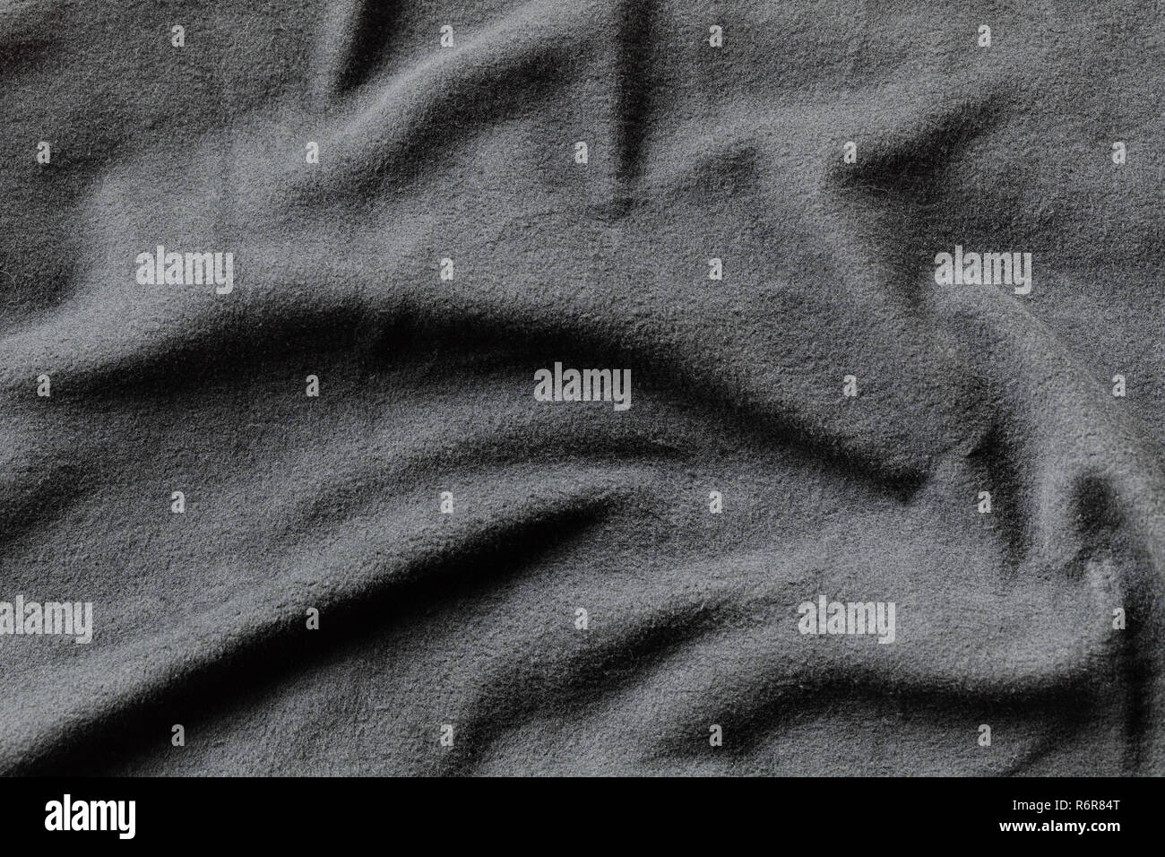 Texture of gray fleece, soft napped insulating fabric made from ...