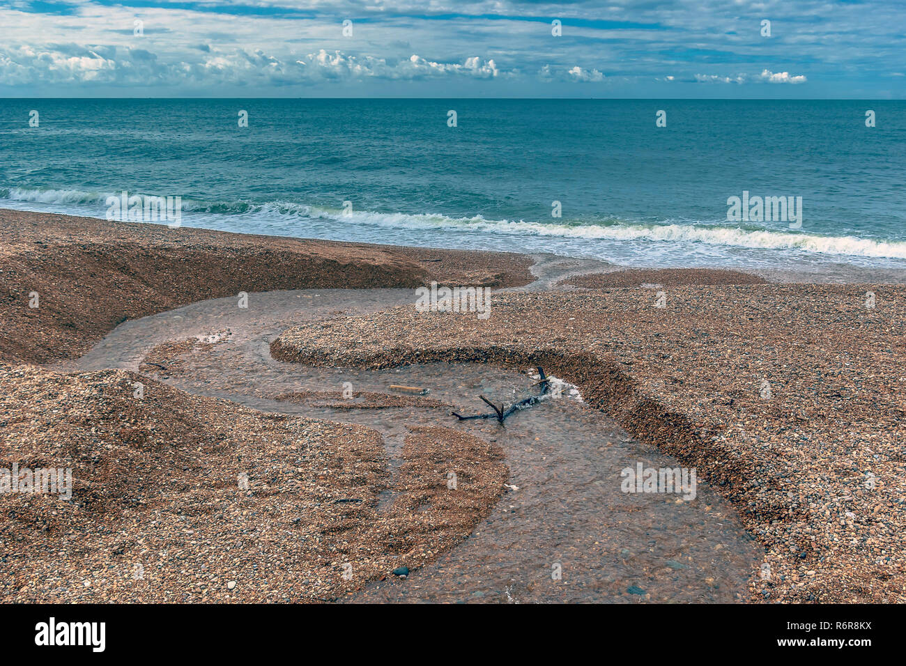 Fresh water stream going into the sea - Cornwall, United Kingdom Stock ...