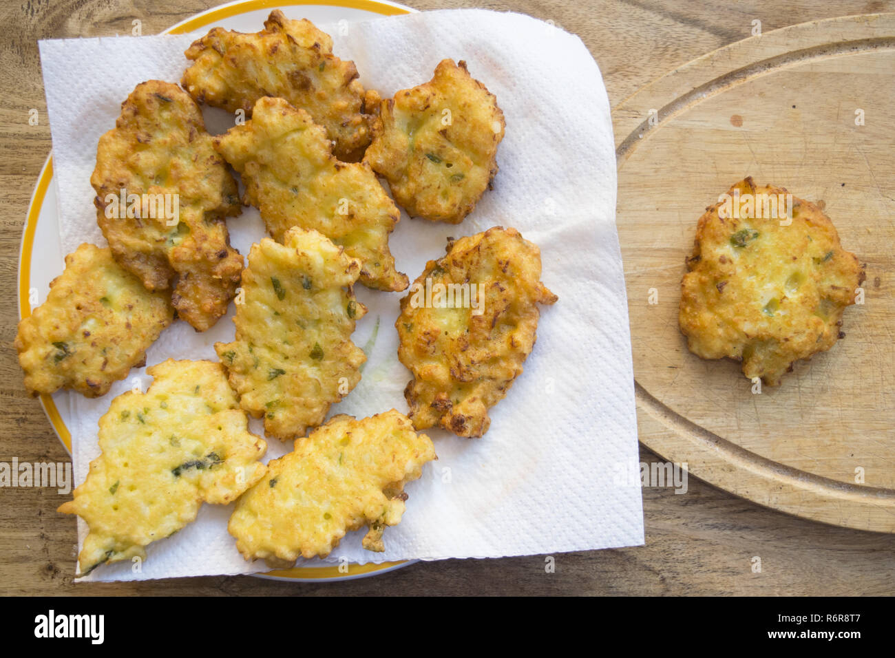 frying of vegetable fritters Stock Photo - Alamy