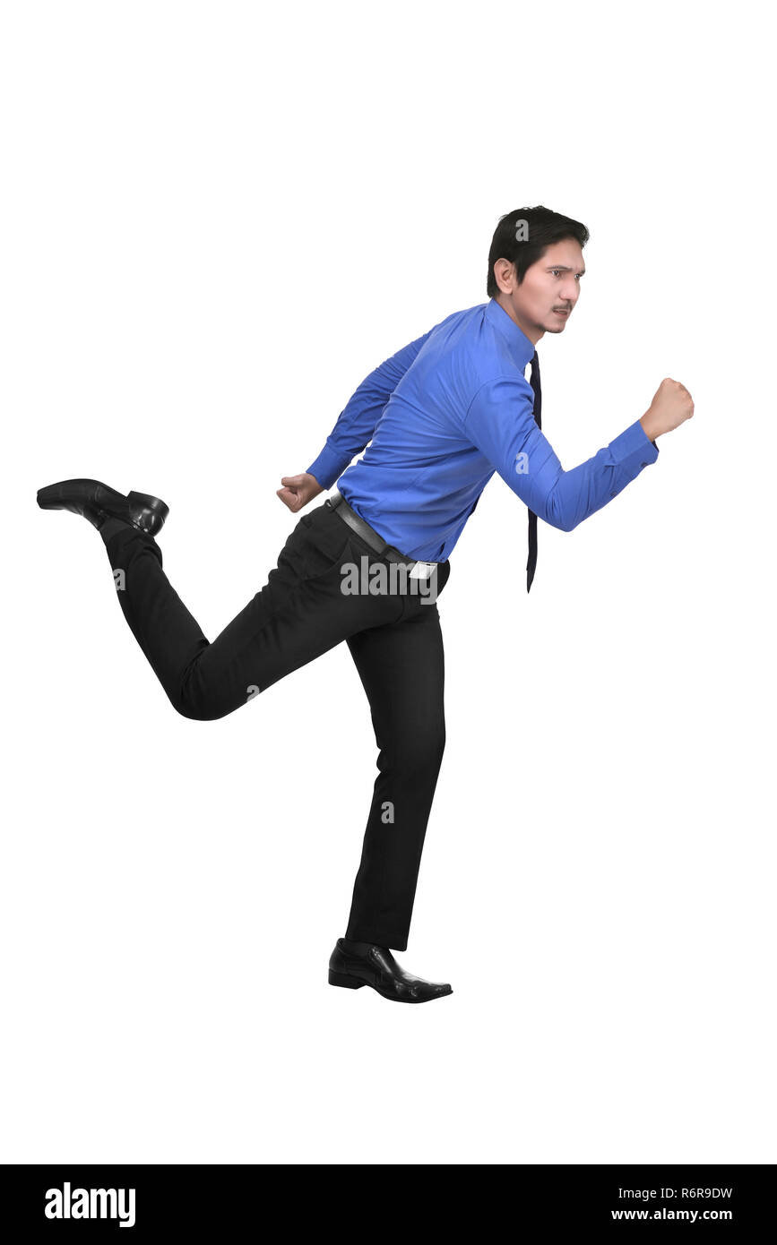 Attractive asian businessman running forward Stock Photo - Alamy