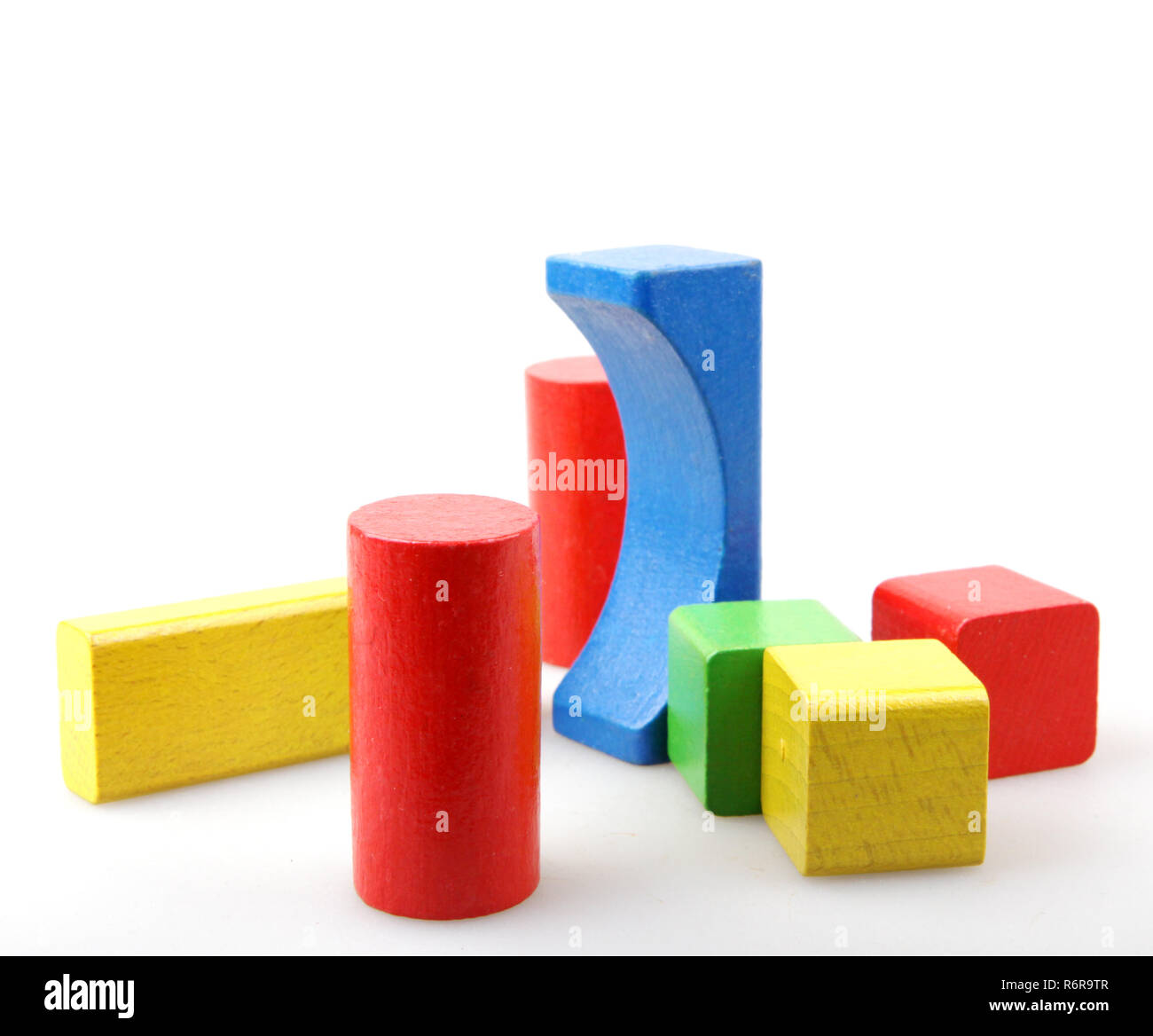 Wooden building blocks isolated on white background Stock Photo - Alamy